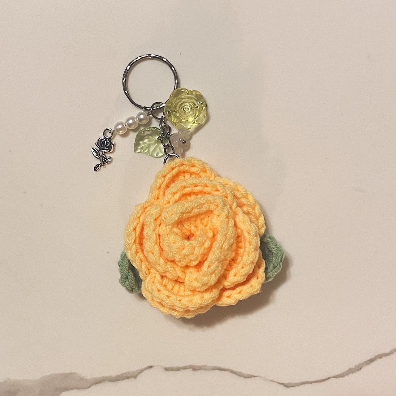 crochet rose keychains 🌹 - yellow and purple... | Depop