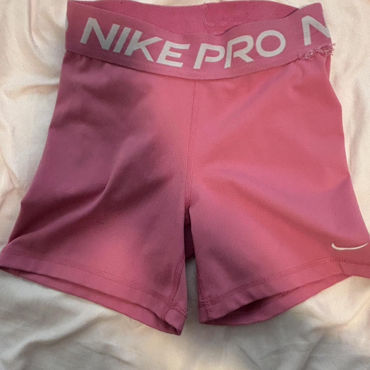 pink nike pro shorts, flaws as shown, waist band flaw - Depop
