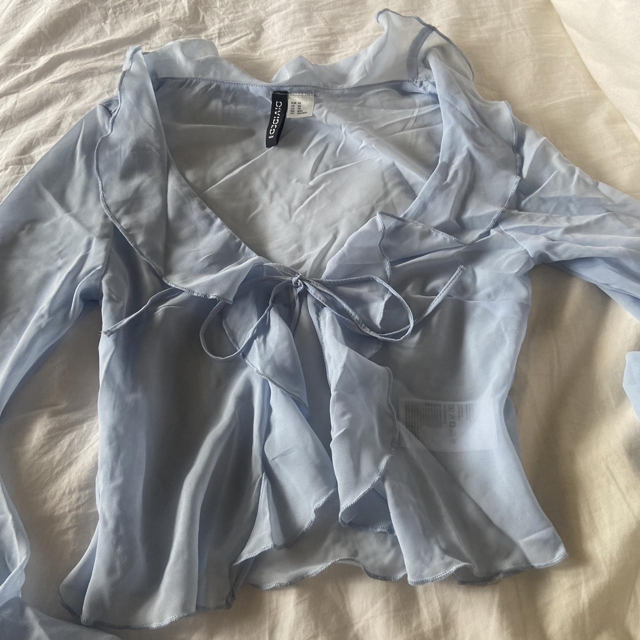 Flowey baby blue sheer top, super pretty on. XS - Depop