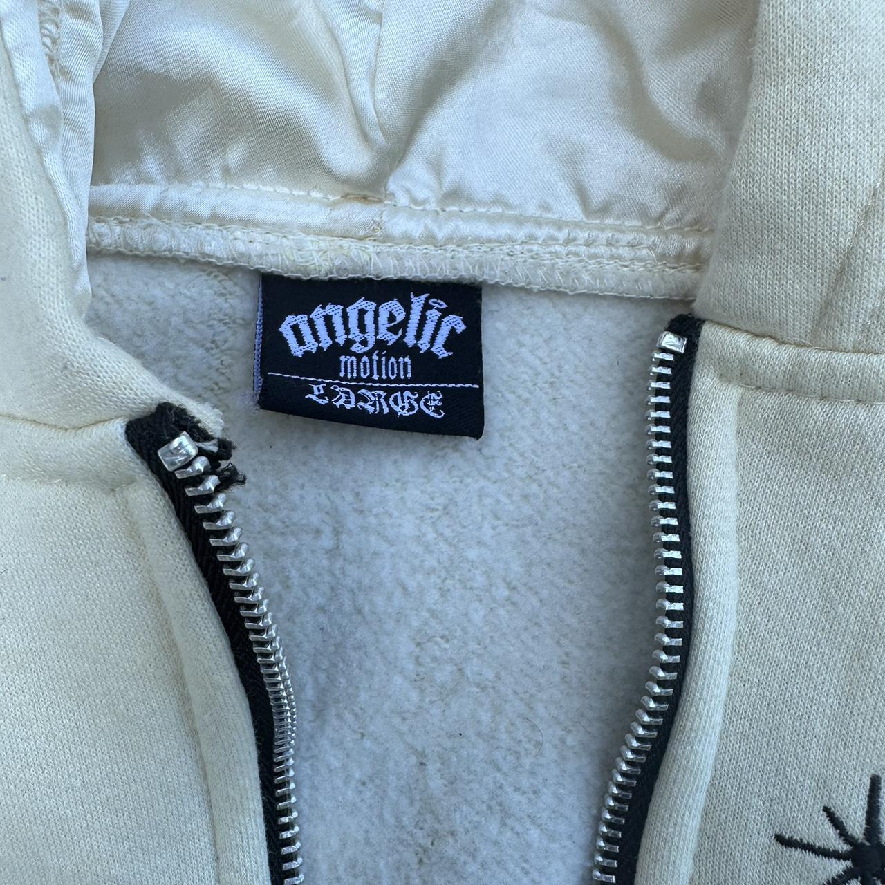 Angelic Motion zip up See discoloring in images - Depop