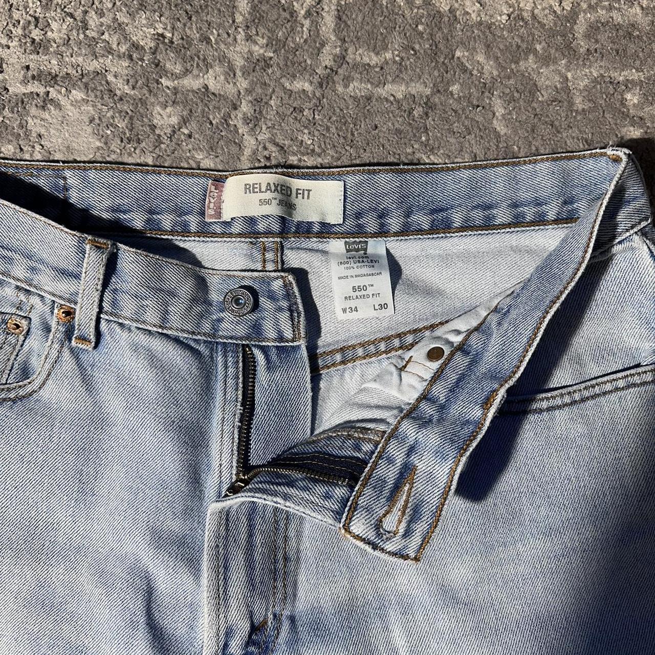 Light wash Levi 550 denim Some stitching out on back... - Depop