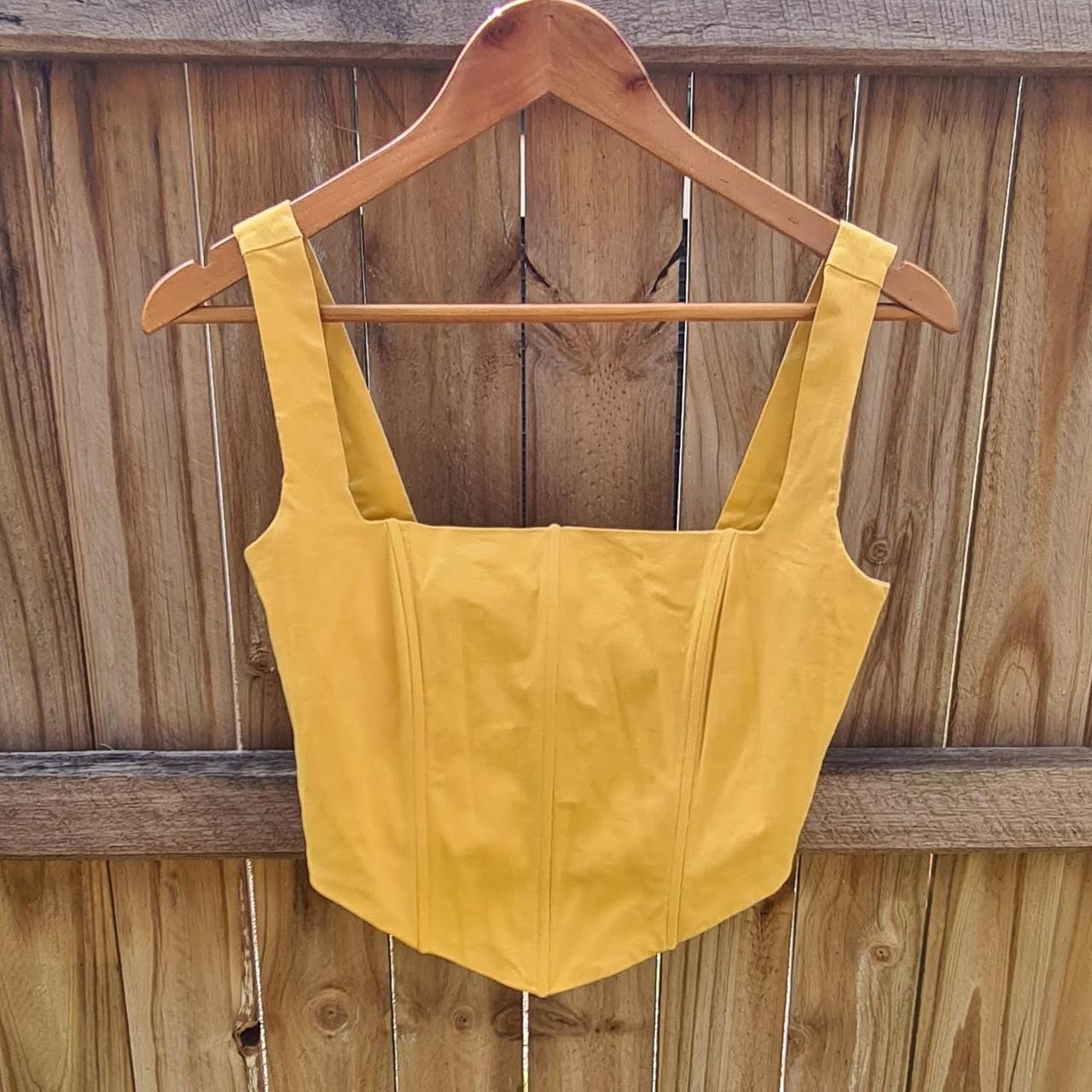 Yellow corset from peppermayo. One mark on the... - Depop