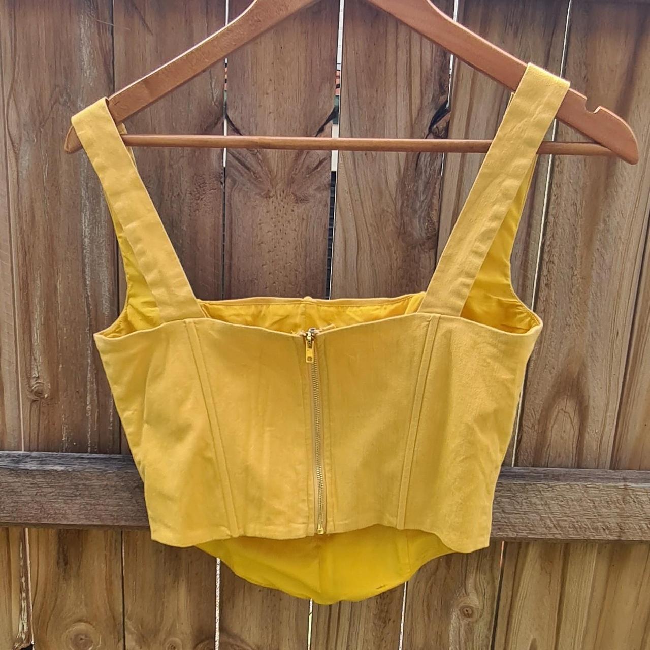 Yellow corset from peppermayo. One mark on the... - Depop