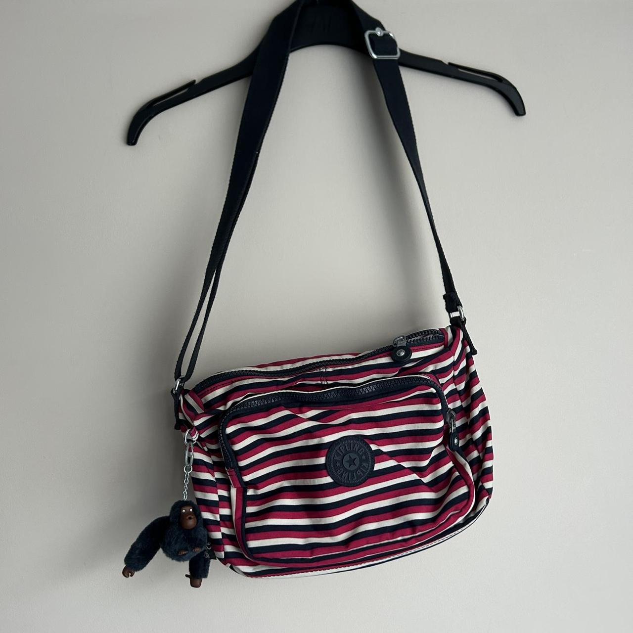 Kipling striped shoulder bag with monkey charm, key... | Depop