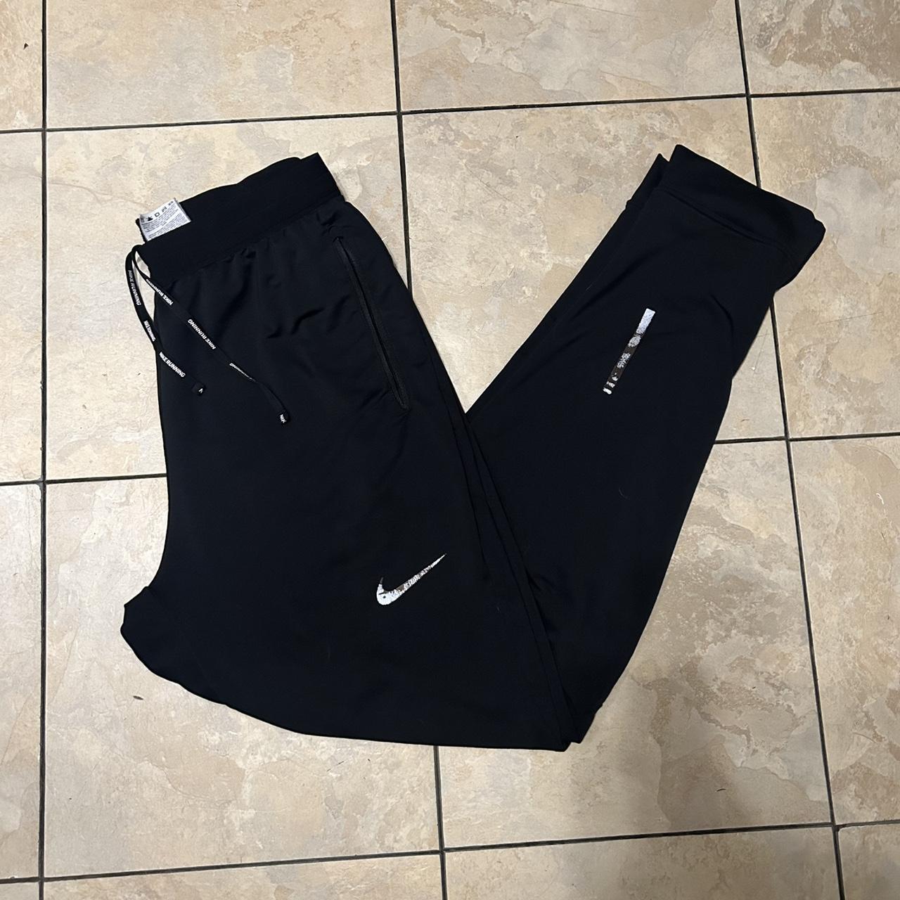Black Nike Dri-Fit sweat pants (Up and down 37.5”)... | Depop