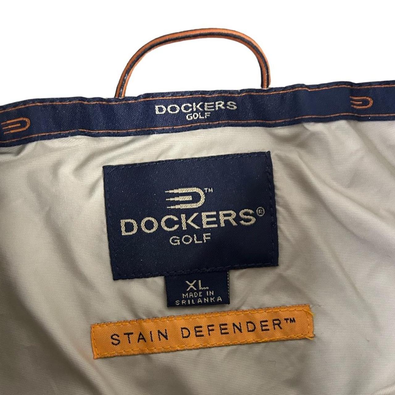Dockers navy and tan skater stripe golf windbreaker... - Depop