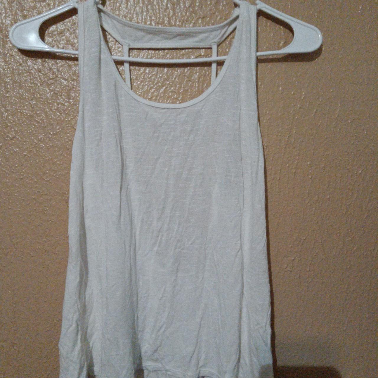 Very cute white tank women's size medium with open... - Depop