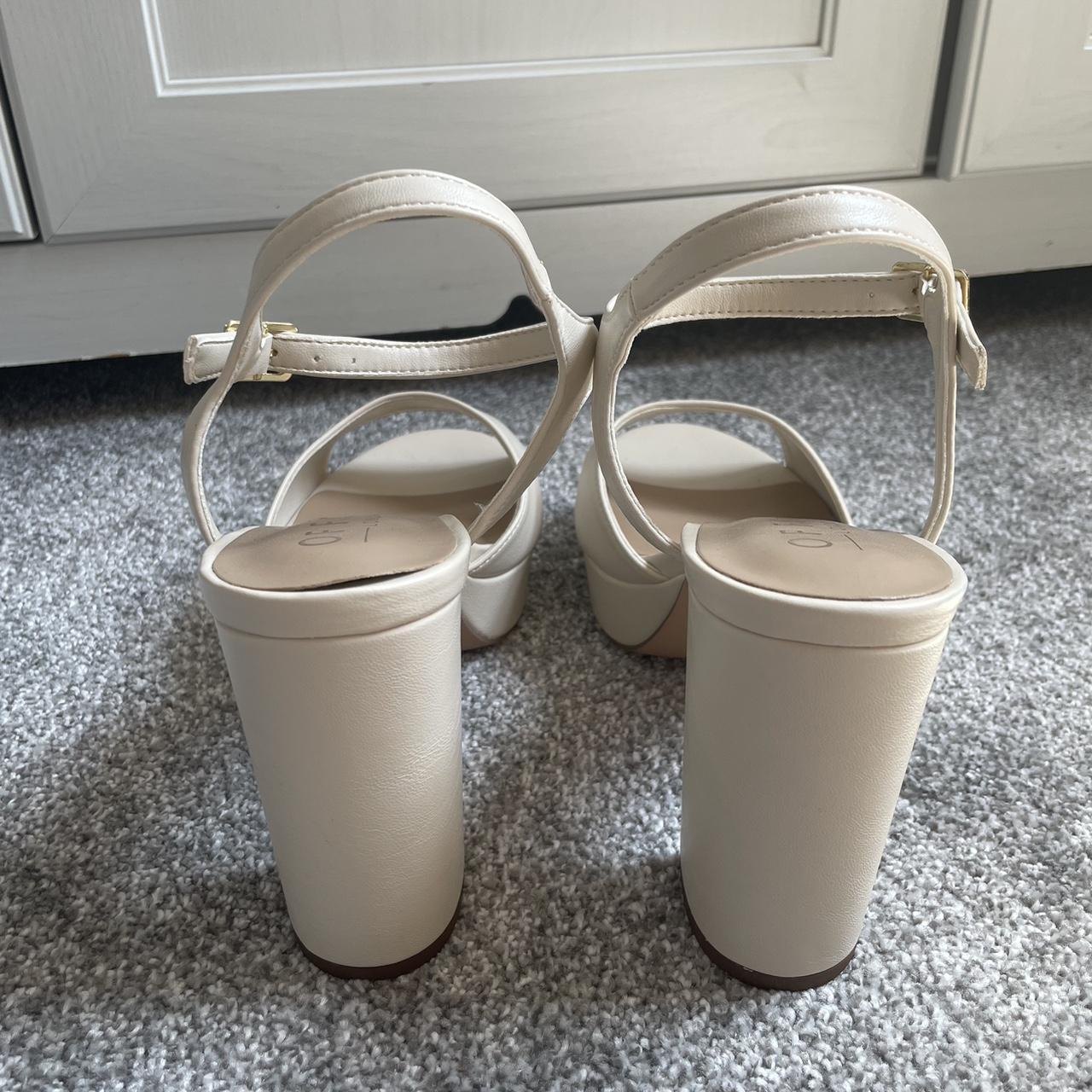 Cream color heels that were only worn once from... - Depop