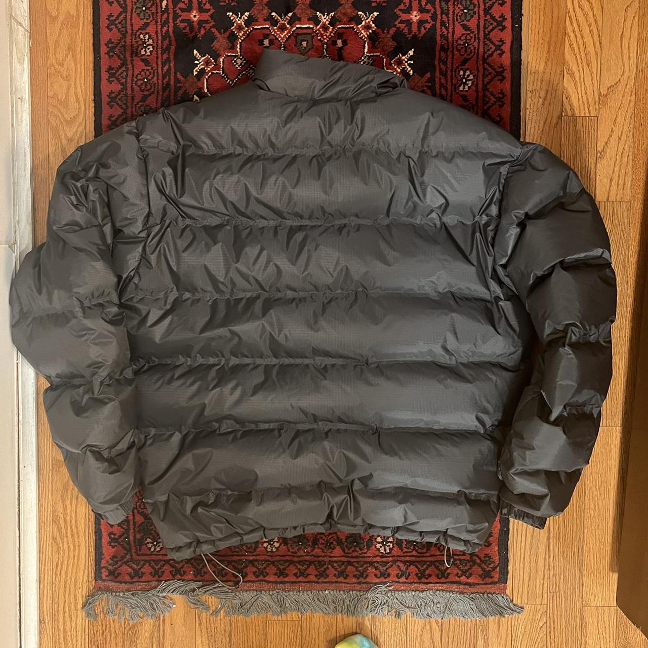 dark grey/black montbell puffer jacket - size... - Depop