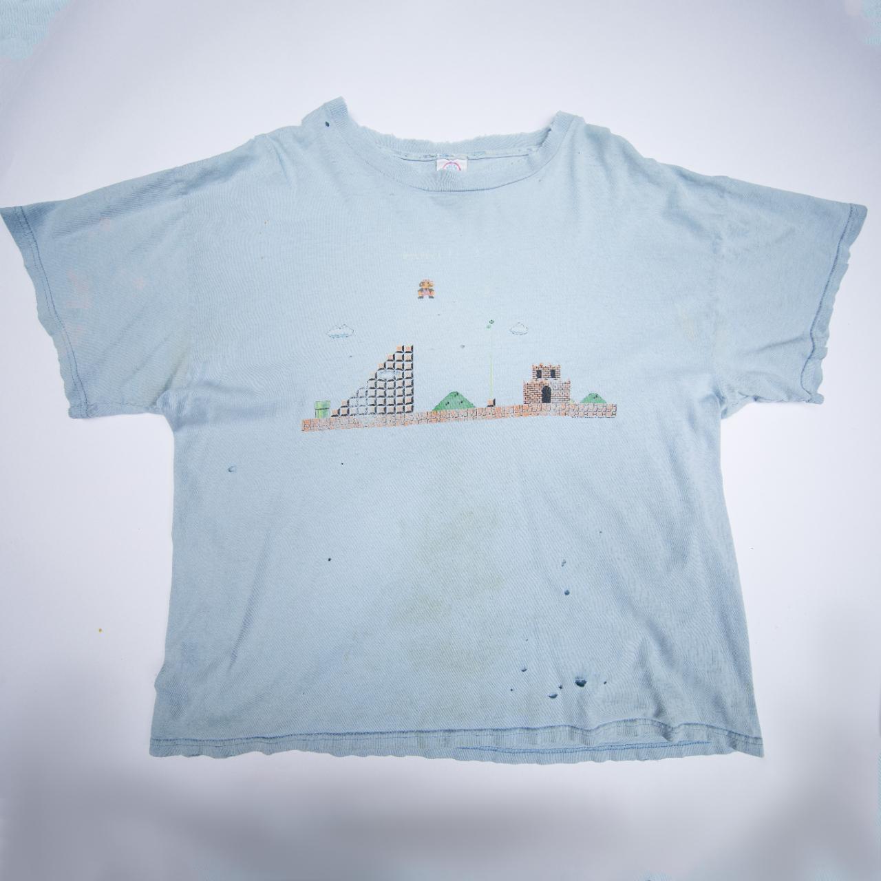 Rip/Distress Mario Video Game Vintage Blue Short... - Depop