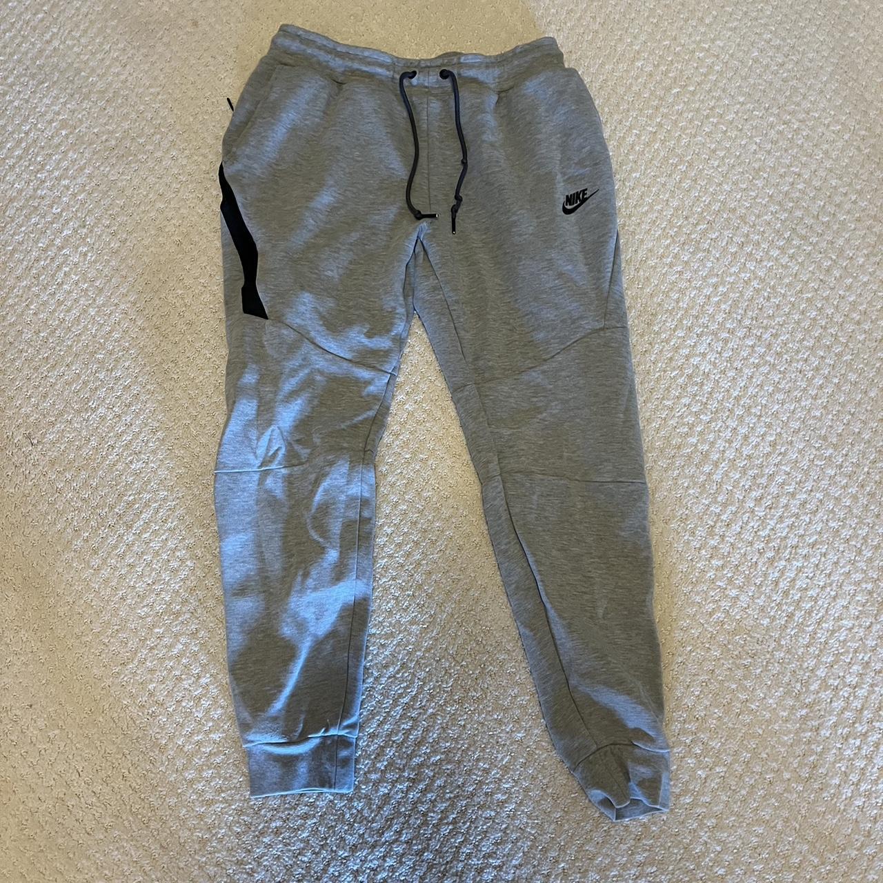 Grey Nike tech pants size medium. Only worn a few... - Depop
