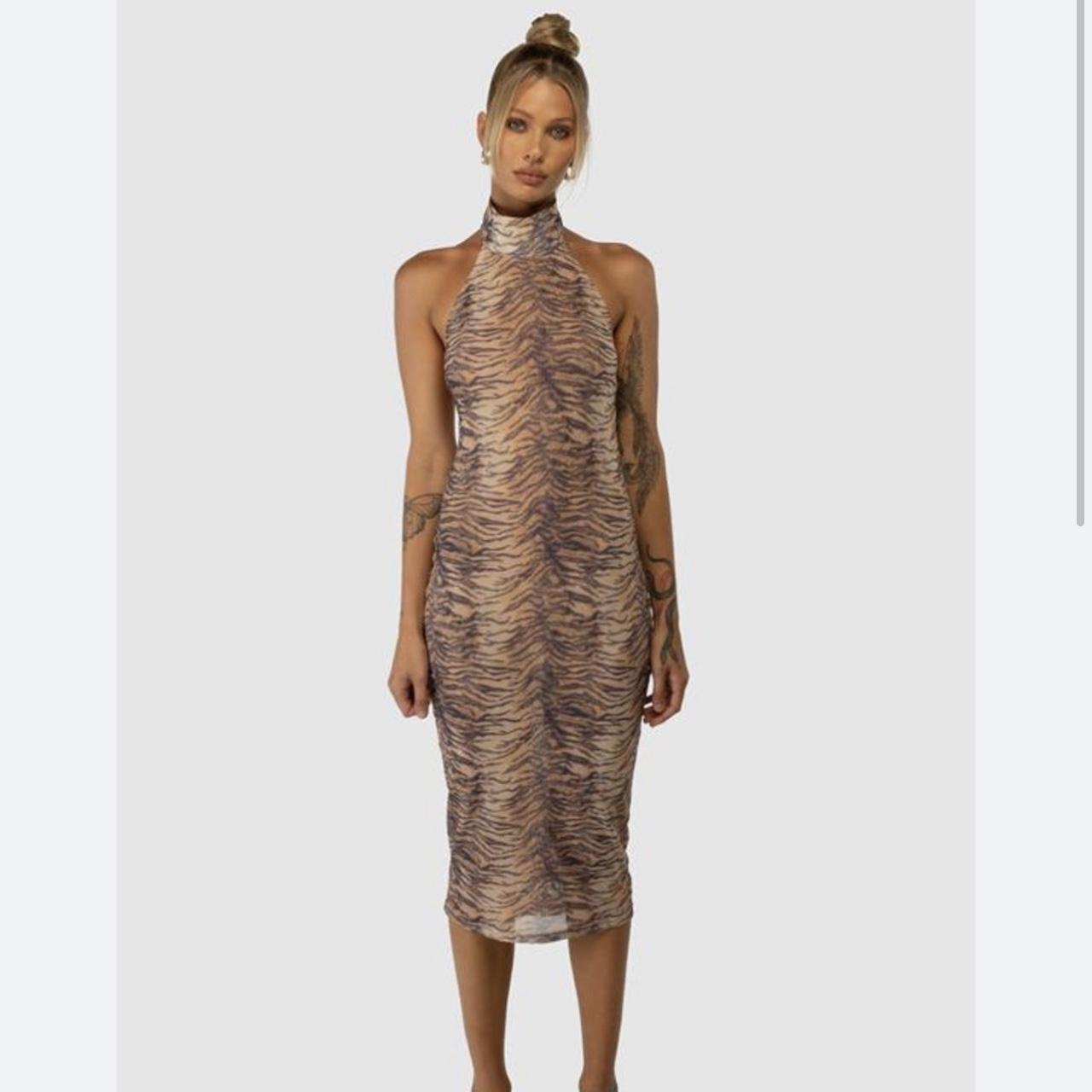 Jagger and Stone Campbell dress in animal print... - Depop