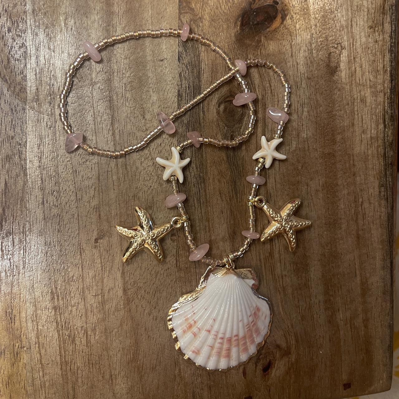 Gold starfish and seashell beaded charm... - Depop