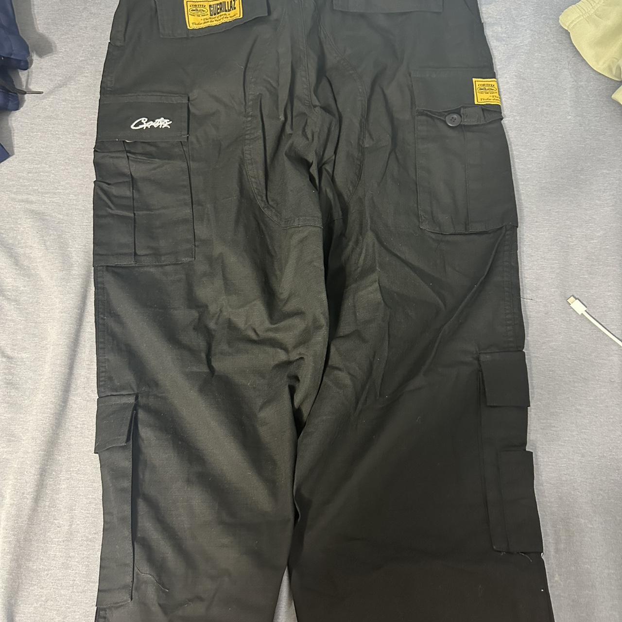 Black and white Corteiz cargo trousers #cargopants... | Depop