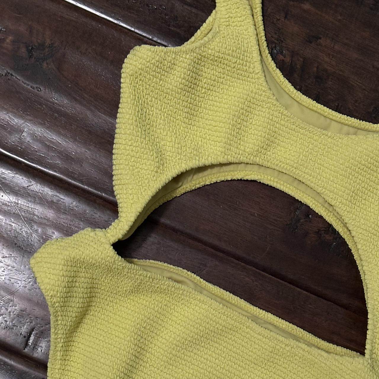 Small light yellow one piece from PacSun - Depop