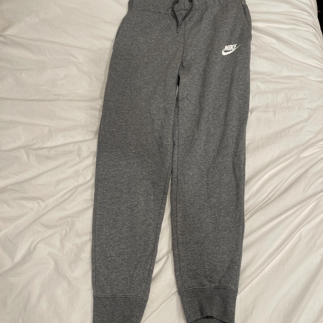 nike grey sweats with logo and drawstring kids large - Depop