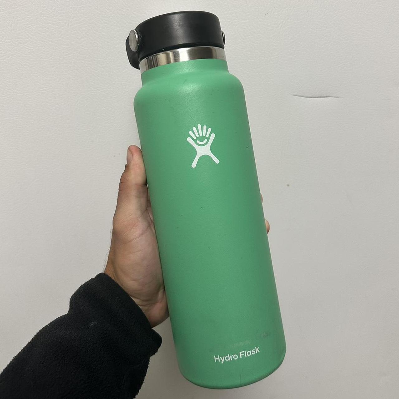 Hydroflask in like green color. 40oz. Used but good... - Depop