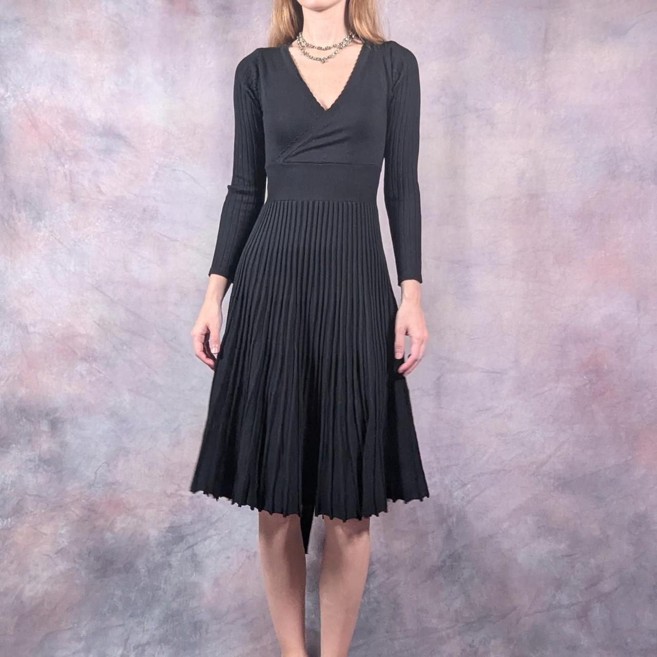 Elegant black pleated midi dress with V neckline and... | Depop