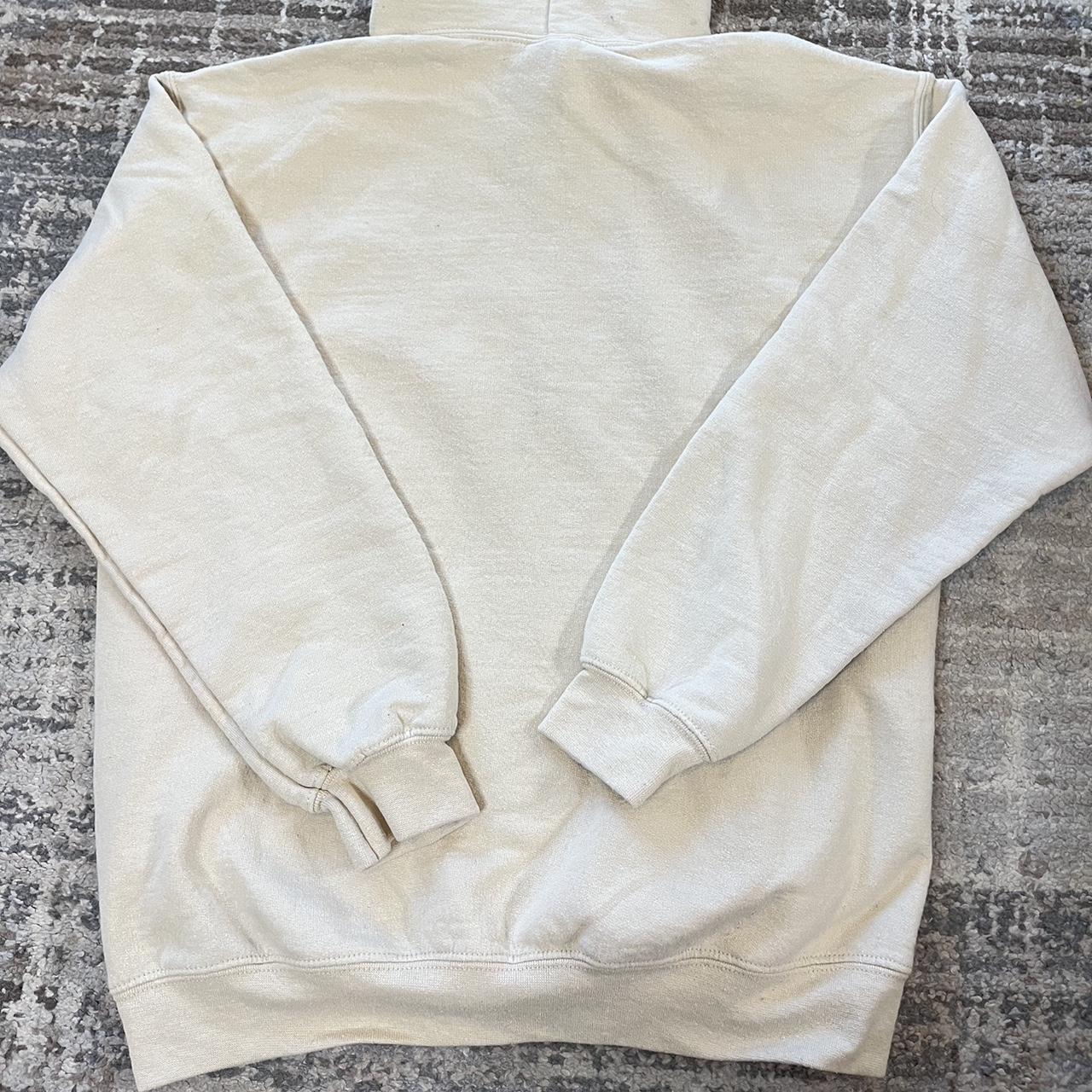 Woman size medium cream colored graphic hoodie - Depop