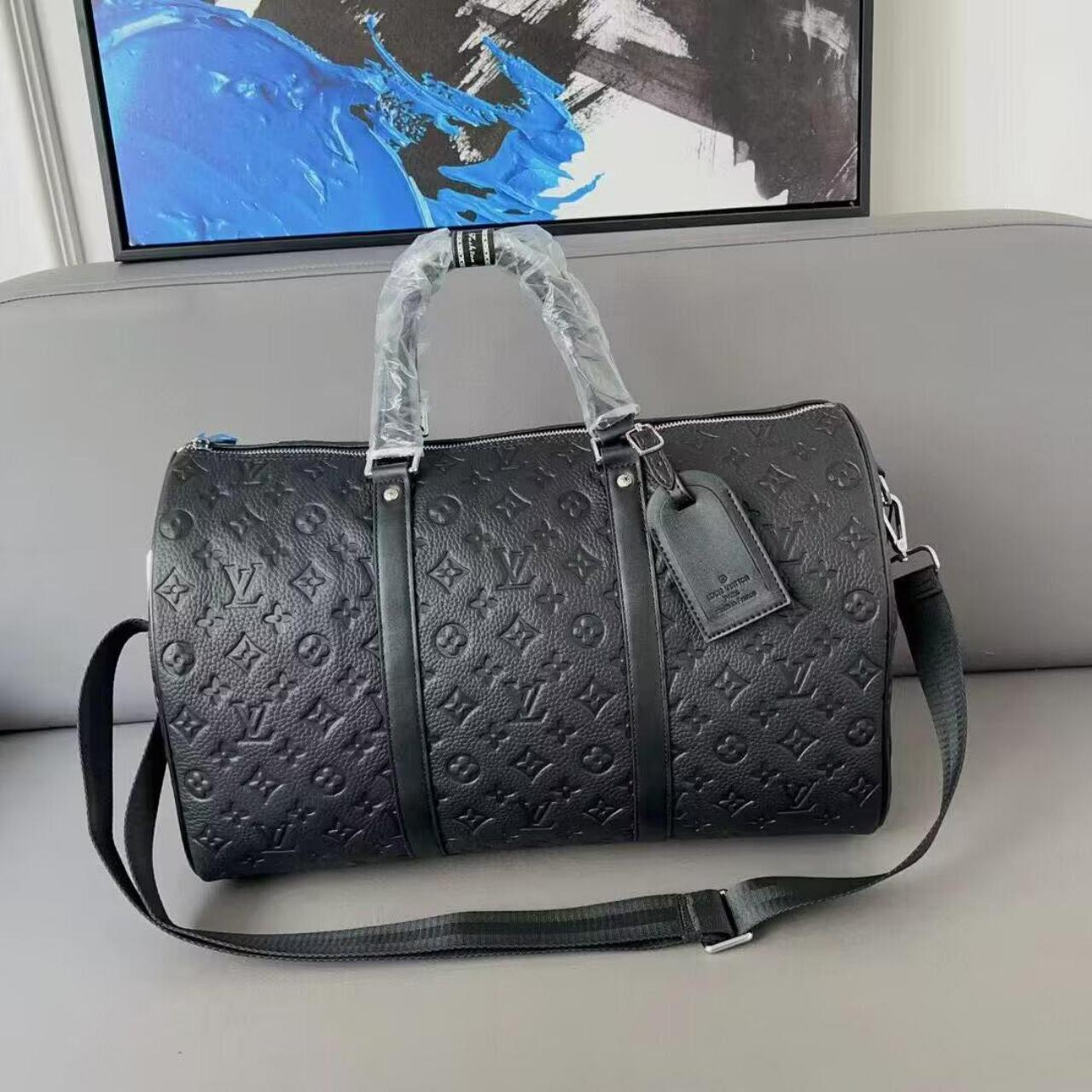 lv duffle bag all black - Depop
