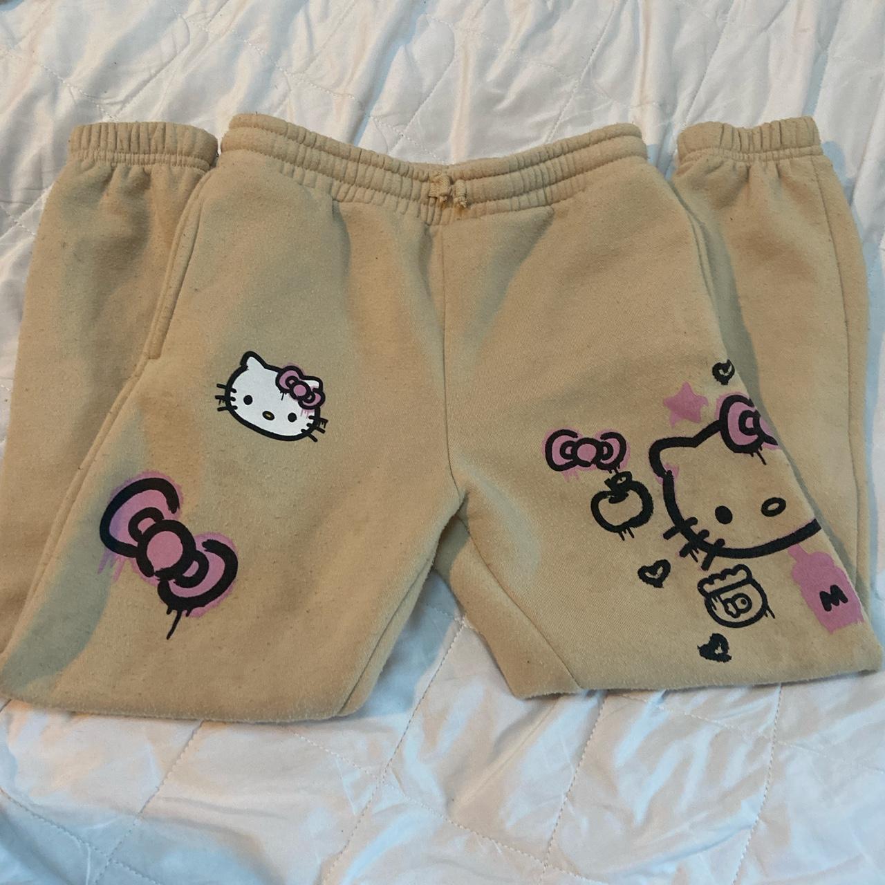 Hello kitty sweat pants, they are a little stained... - Depop
