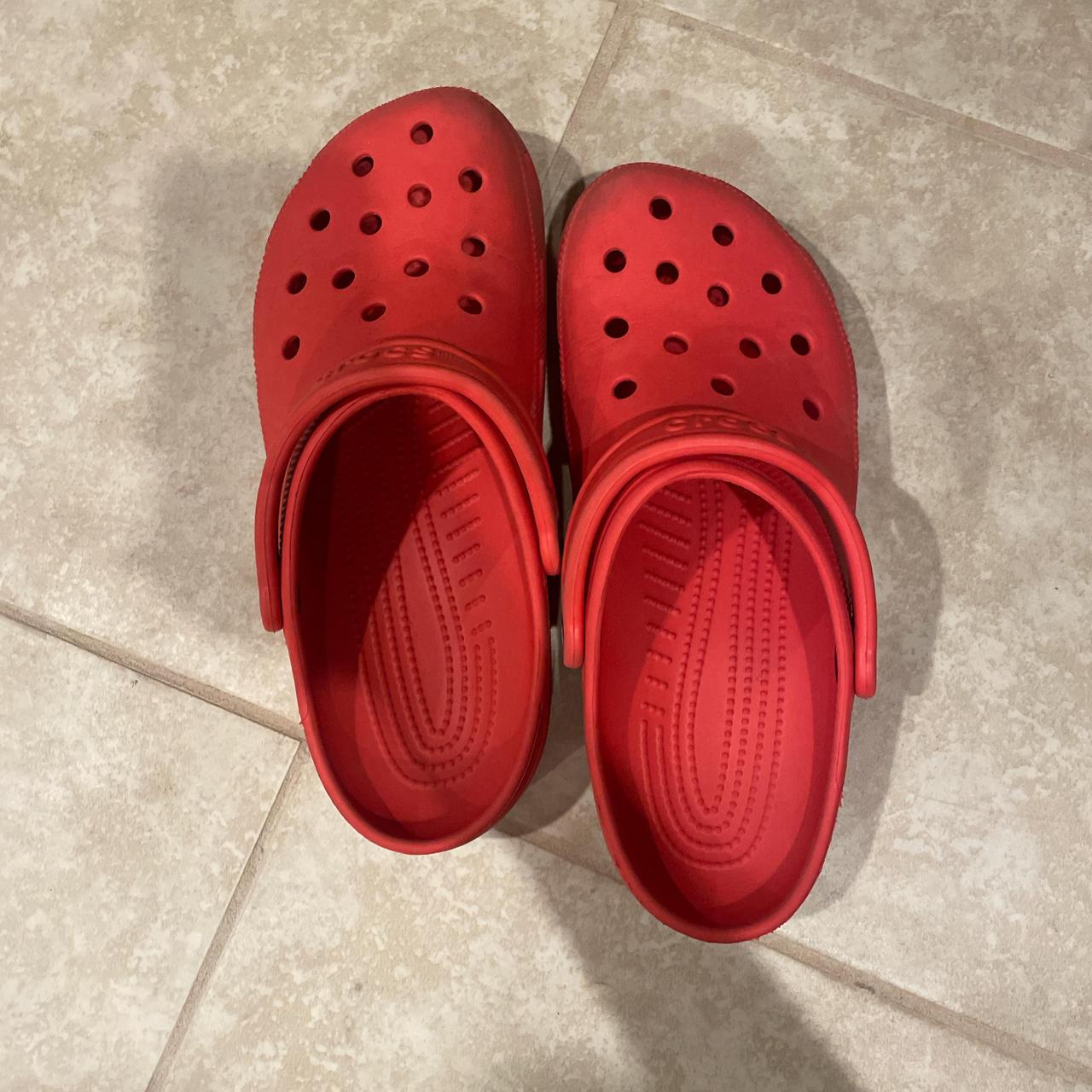 Red crocs buy them for 15 and you get all the widgets - Depop