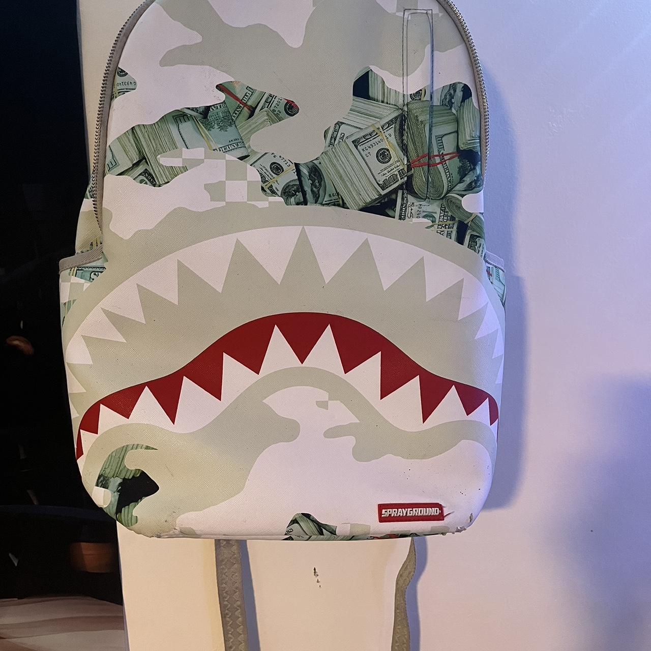 spray ground backpack, noticeable wear and kinda... - Depop