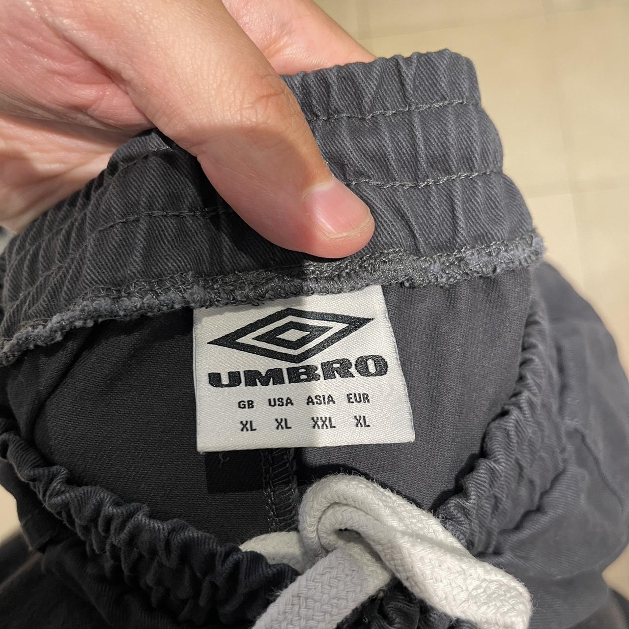 Umbro grey and white canvas tracksuit bottoms.... - Depop