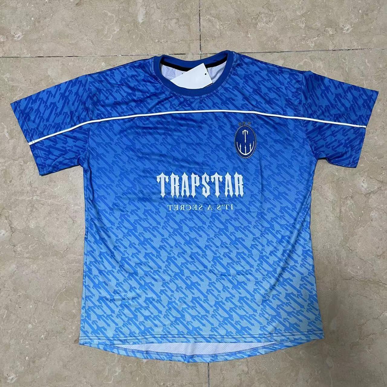 TRAPSTAR T MONOGRAM FOOTBALL JERSEY Blue gradient... - Depop