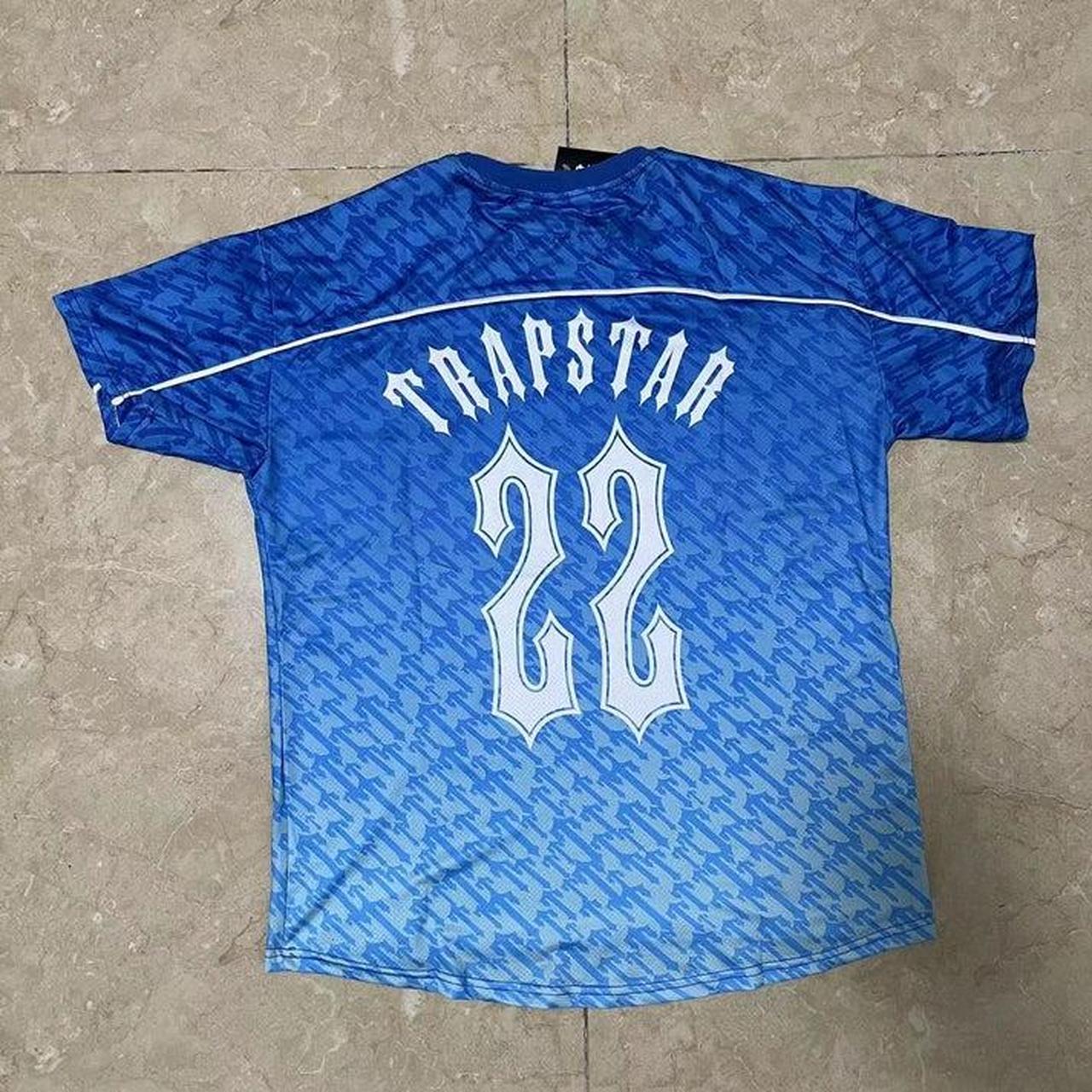 TRAPSTAR T MONOGRAM FOOTBALL JERSEY Blue gradient... - Depop
