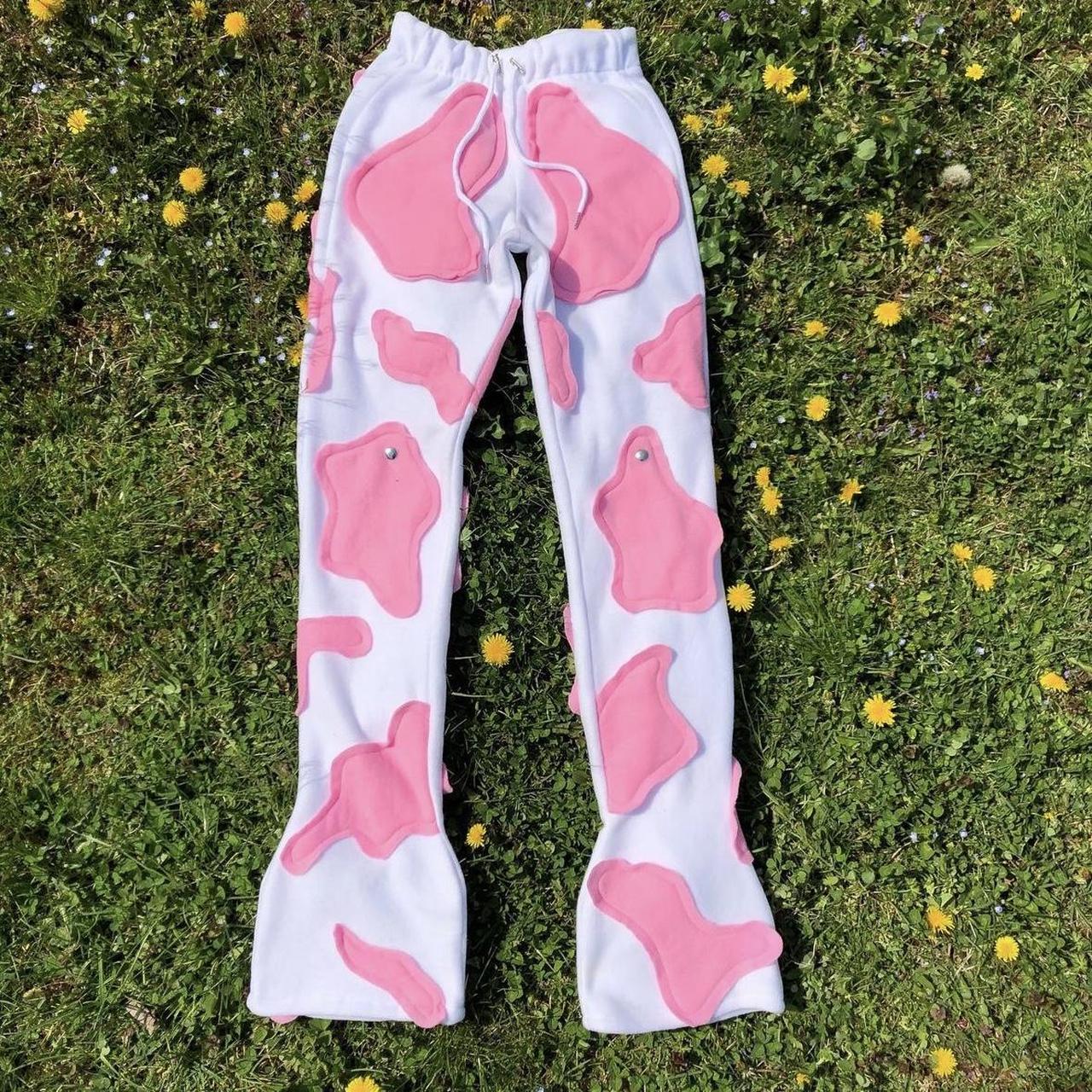 Bubble gum cow print stacked sweats NYC vibez Size... - Depop
