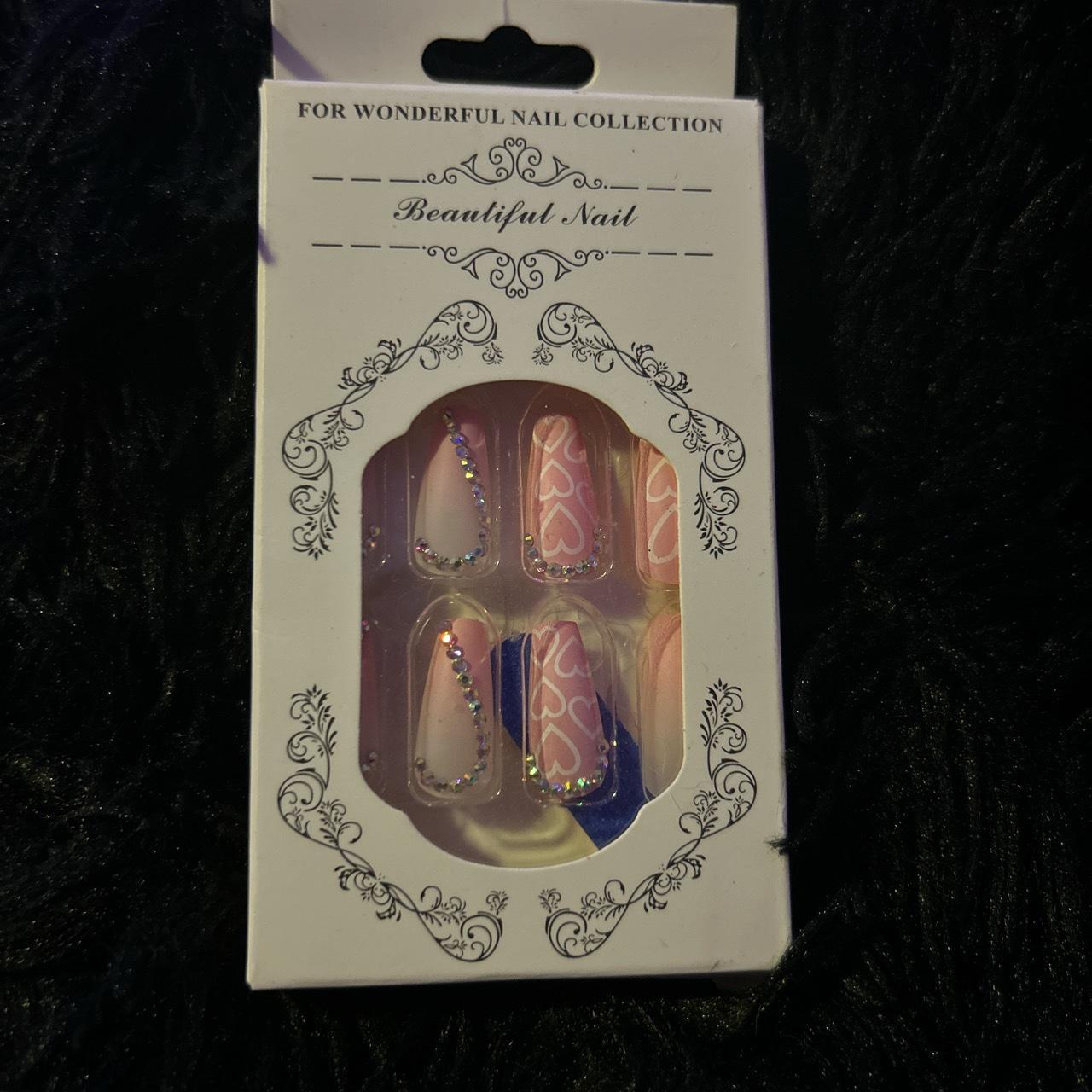 Pink gem heart patterned nails with gems that make a... - Depop