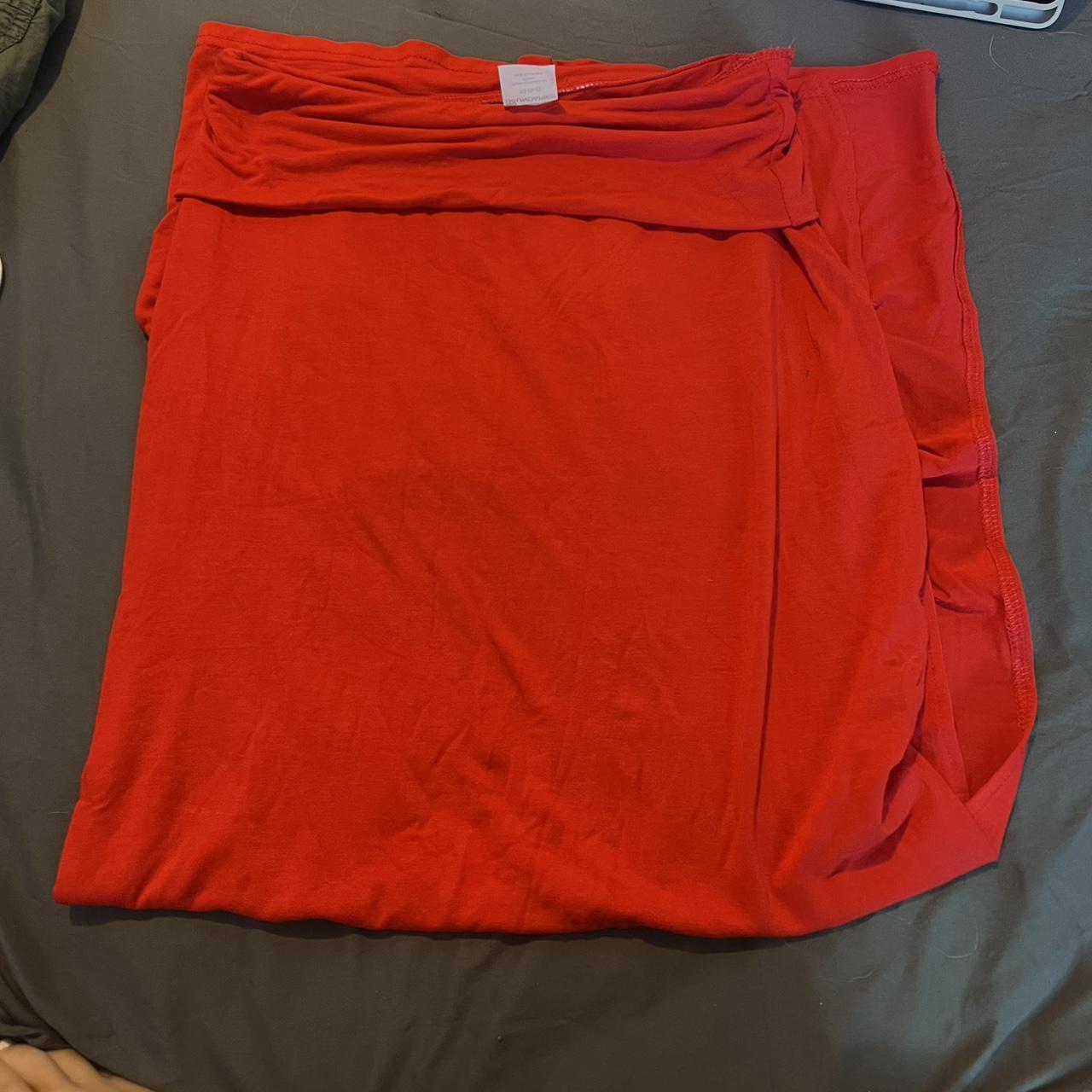 red fold over floor length skirt with a slit on the... | Depop