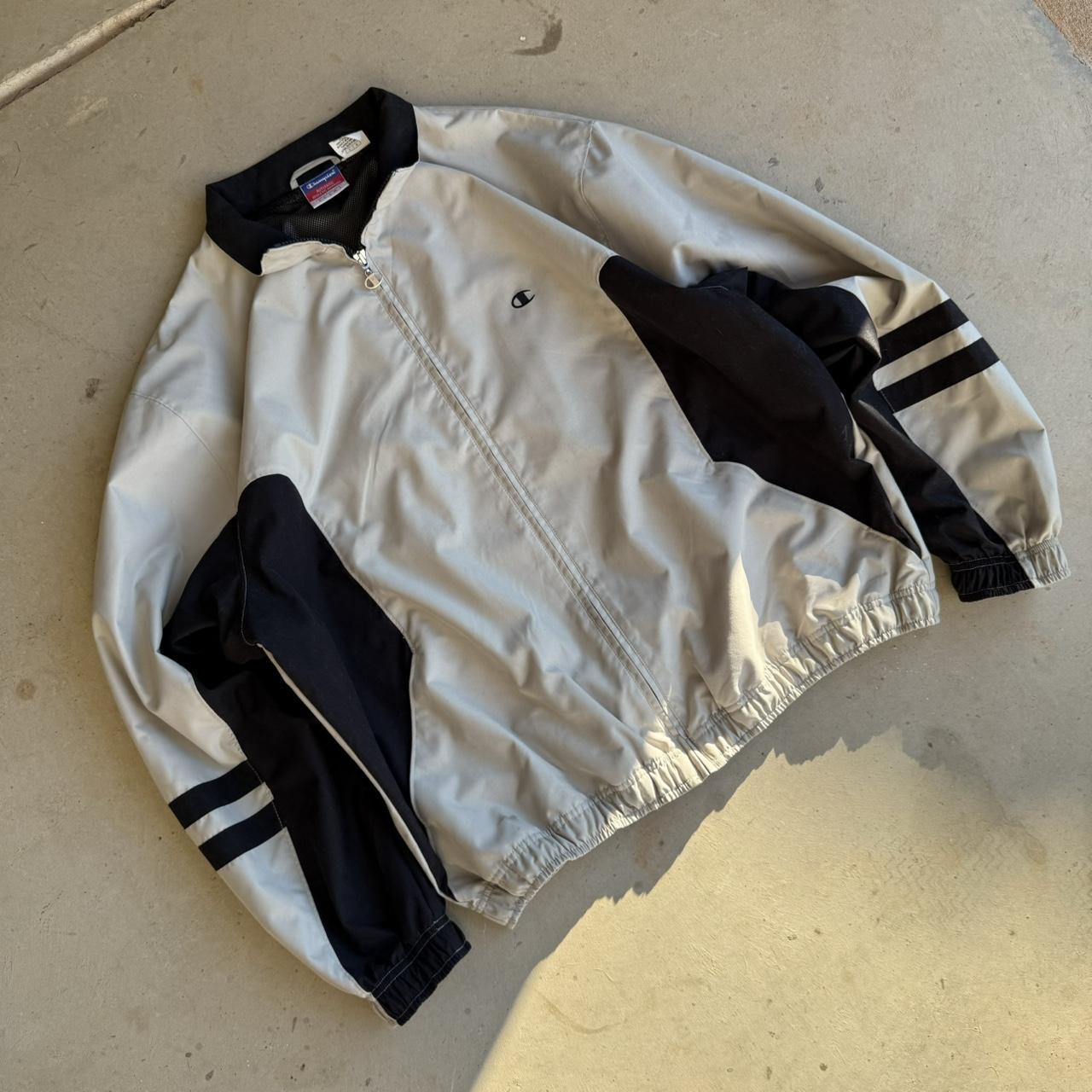 Champion beige and black windbreaker... | Depop