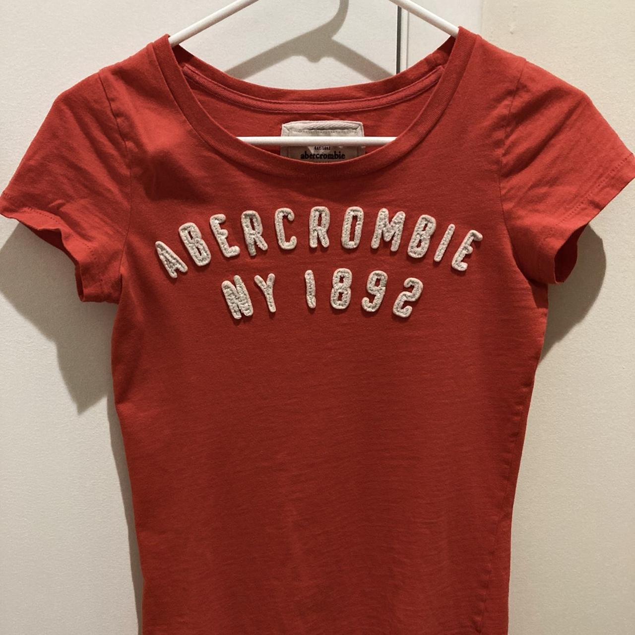 Red Abercrombie Shirt Says L size on tag, but its... - Depop