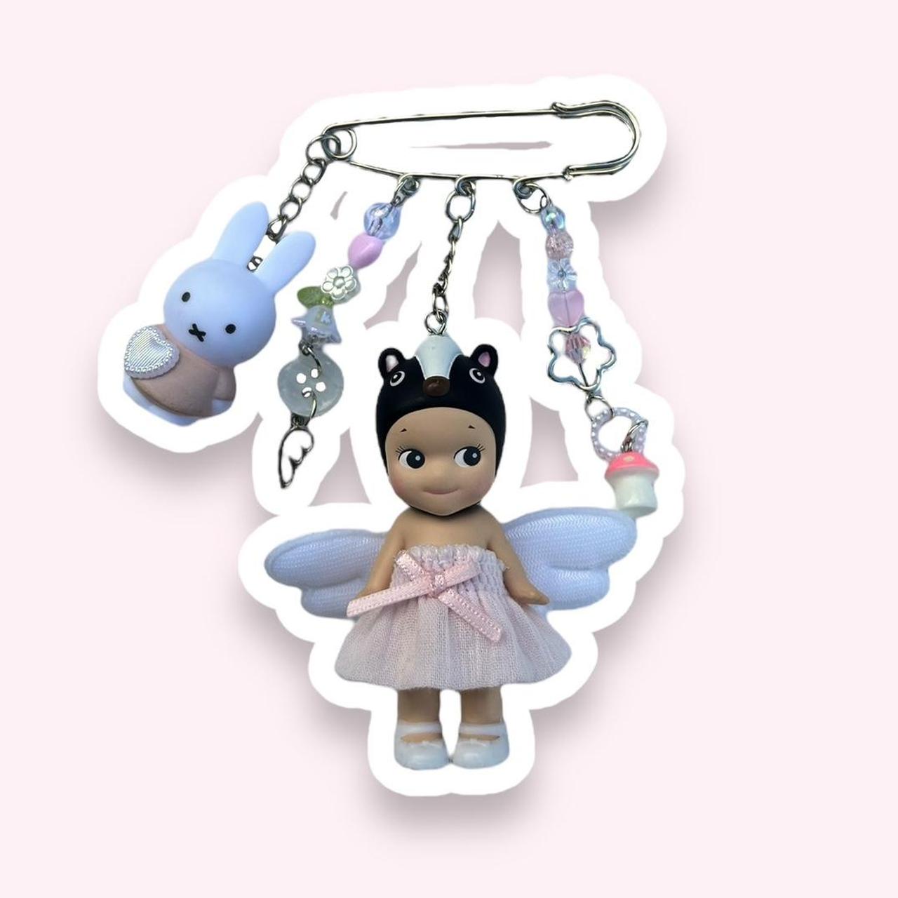 sonny angel skunk keychain made using an authentic... | Depop