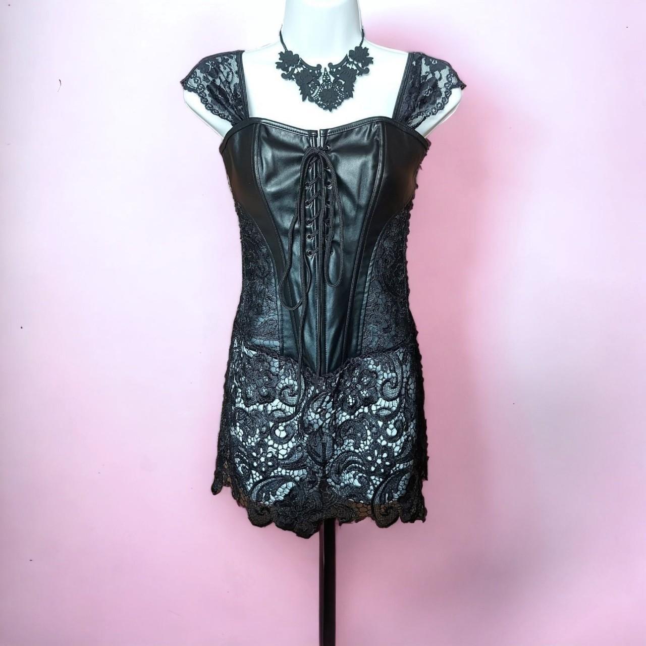 Corset top / short dress with lace trim and cut-outs... - Depop