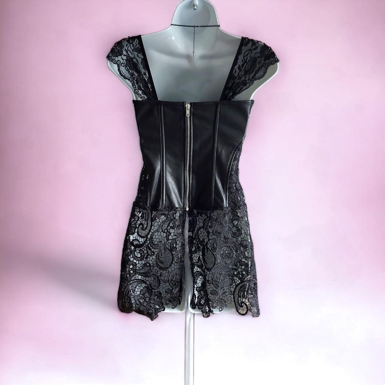 Corset top / short dress with lace trim and cut-outs... - Depop