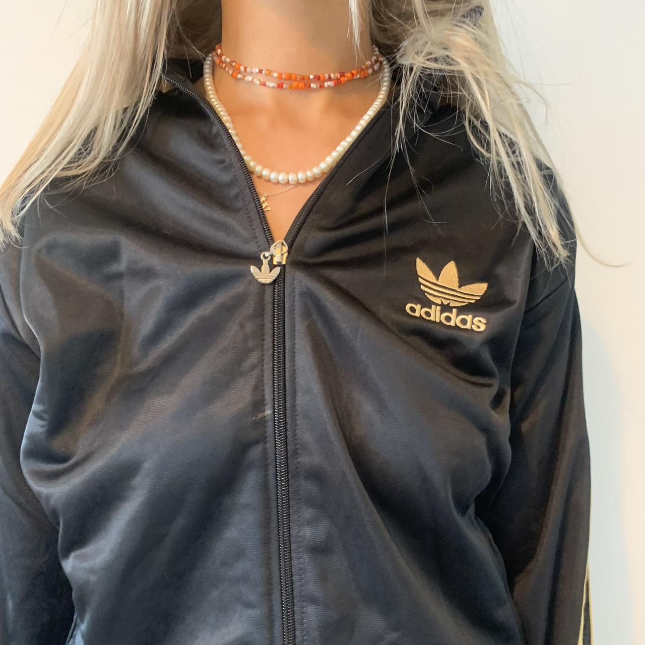 Adidas Women's Black and Gold Jacket | Depop
