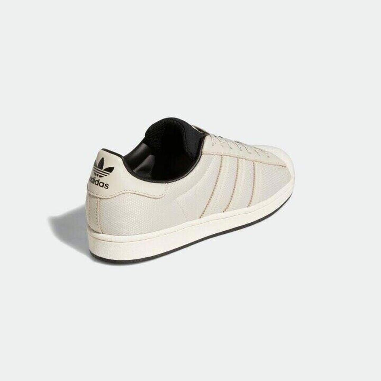 Description: Elevate your style with the Adidas... | Depop