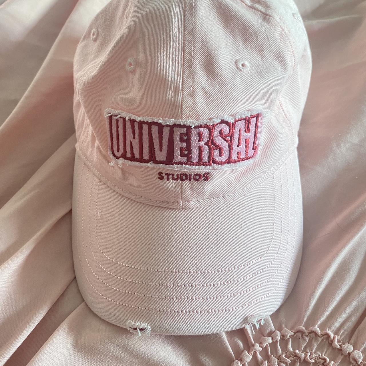Y2k universal studios pink hat. rips are part of the... - Depop