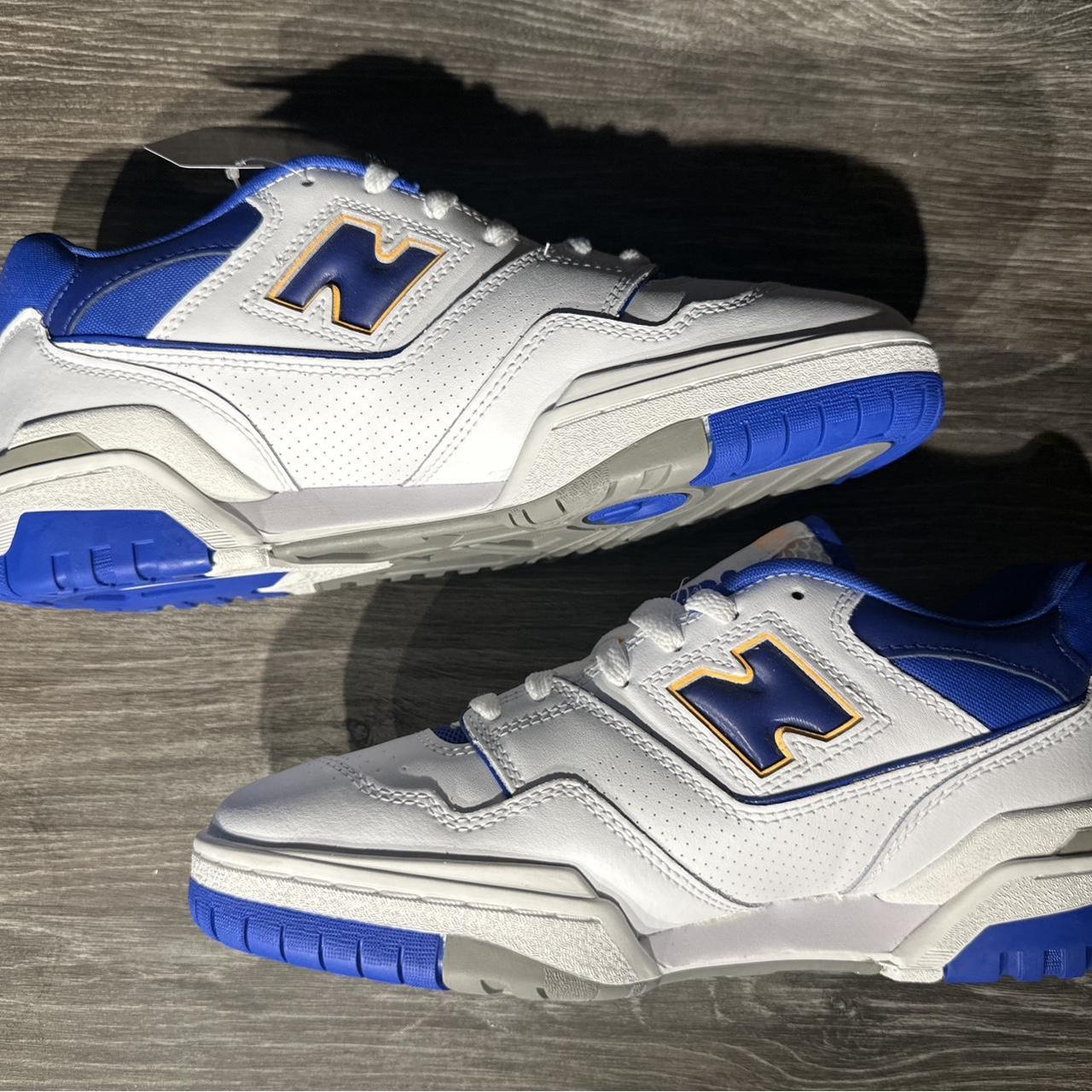 The New Balance 550 White Vibrant Orange is the... - Depop