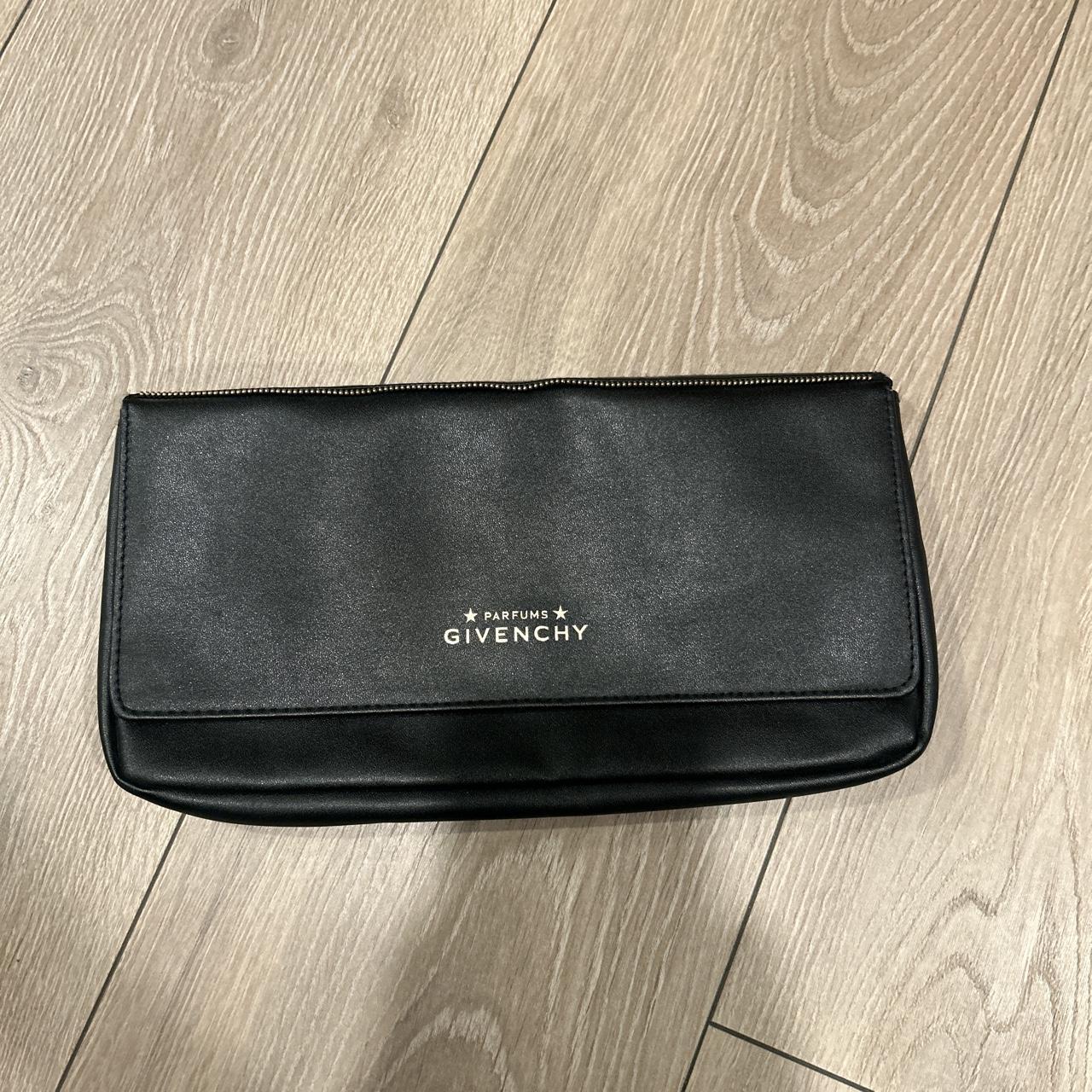 Givenchy Clutch With chic zipper design on the top... - Depop