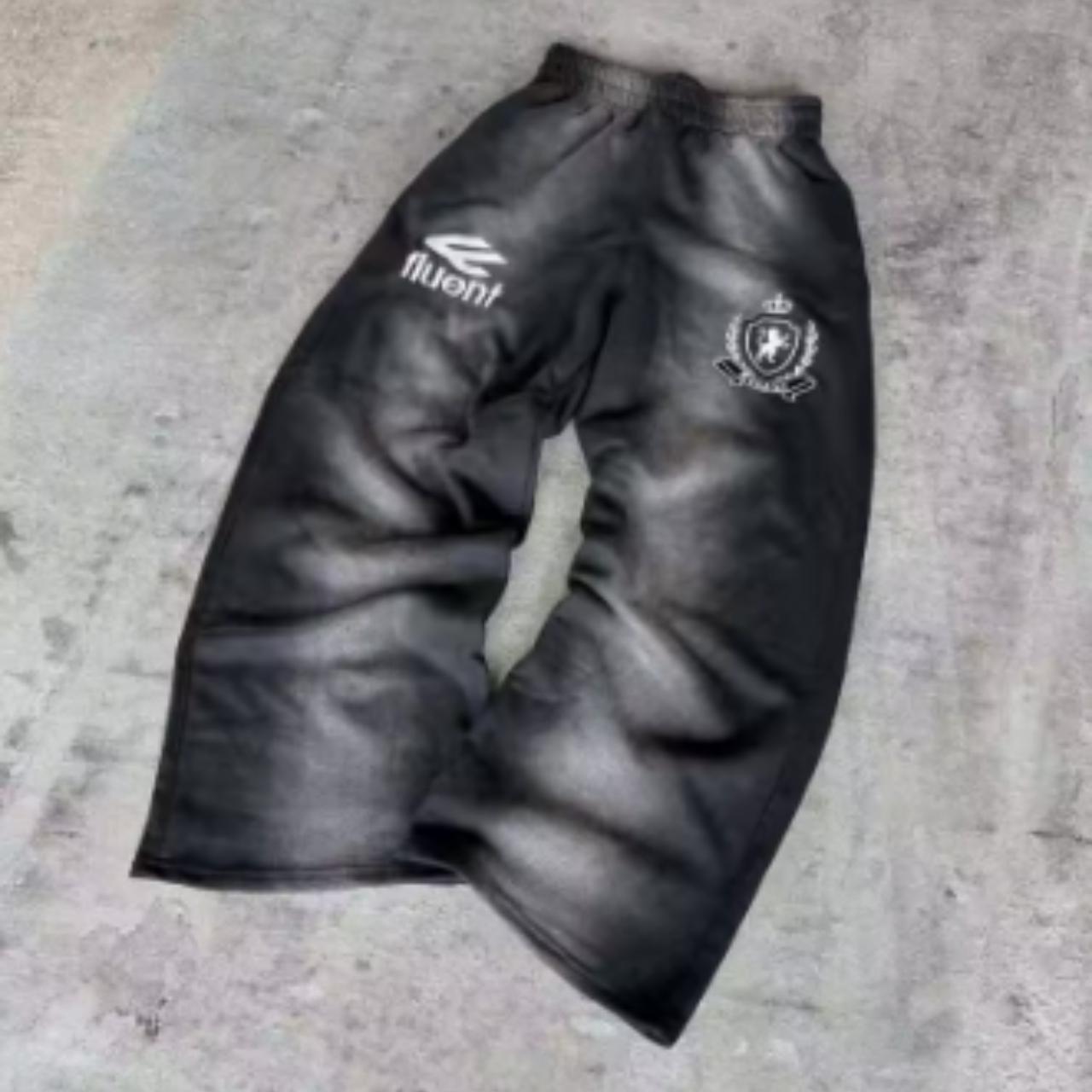 Fluent Sweatpants Features bold “fluent” branding... | Depop