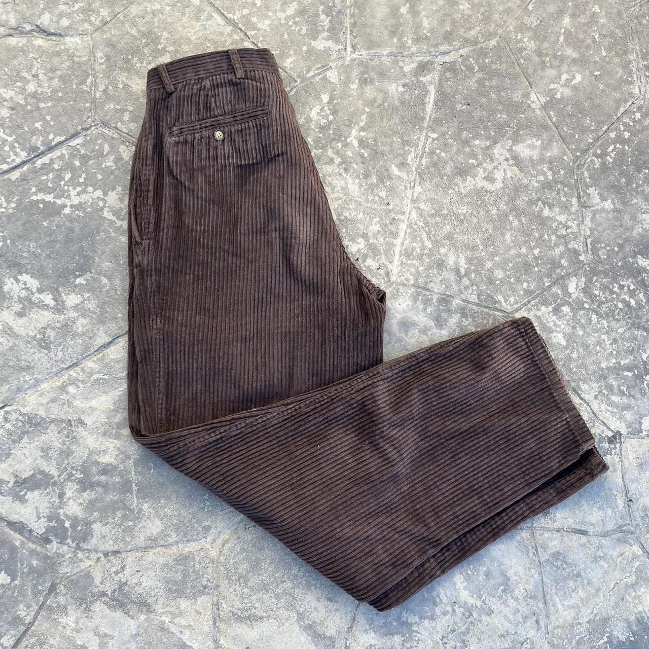 Brown corduroy trousers with a relaxed fit,... - Depop