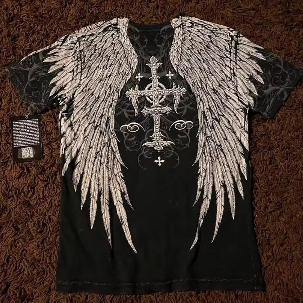 Black Affliction graphic tee with skulls and wings... | Depop