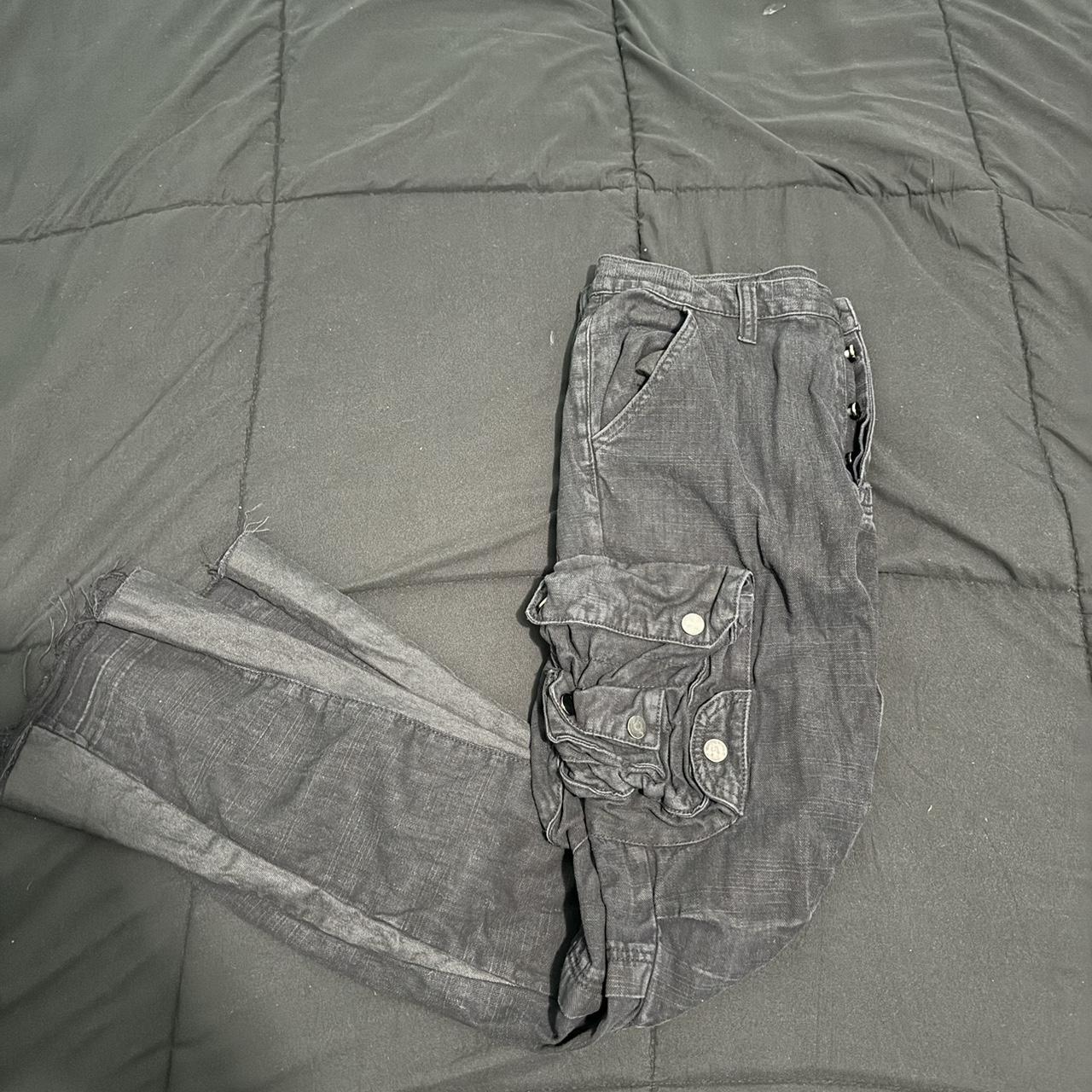 Mnml black cargo pockets jeans with flare at the... - Depop