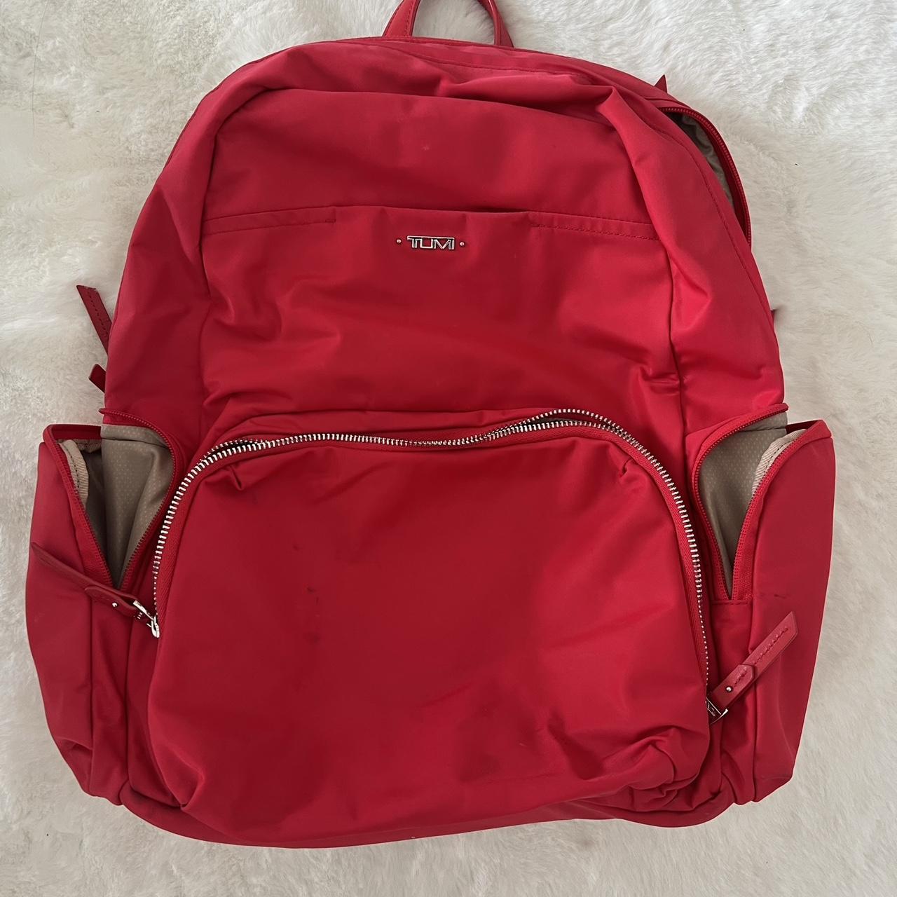 Tumi red/pink backpack, with many pockets, clean and... - Depop