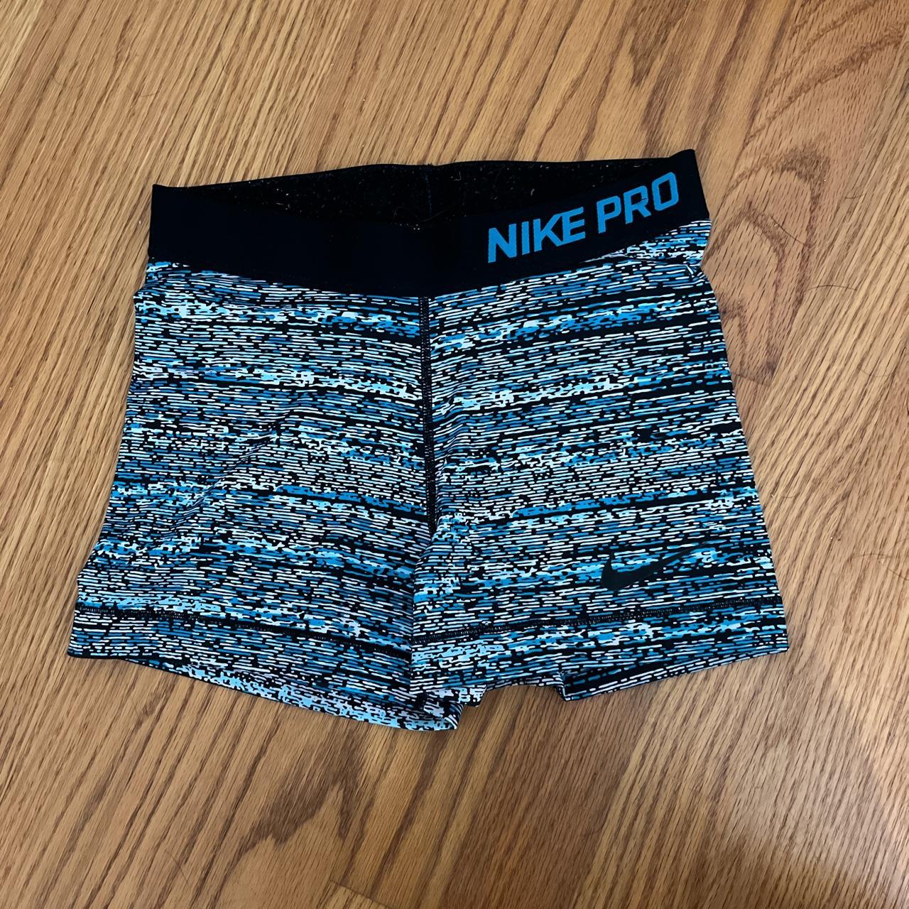 Blue patterned Nike Pros, size small - Depop