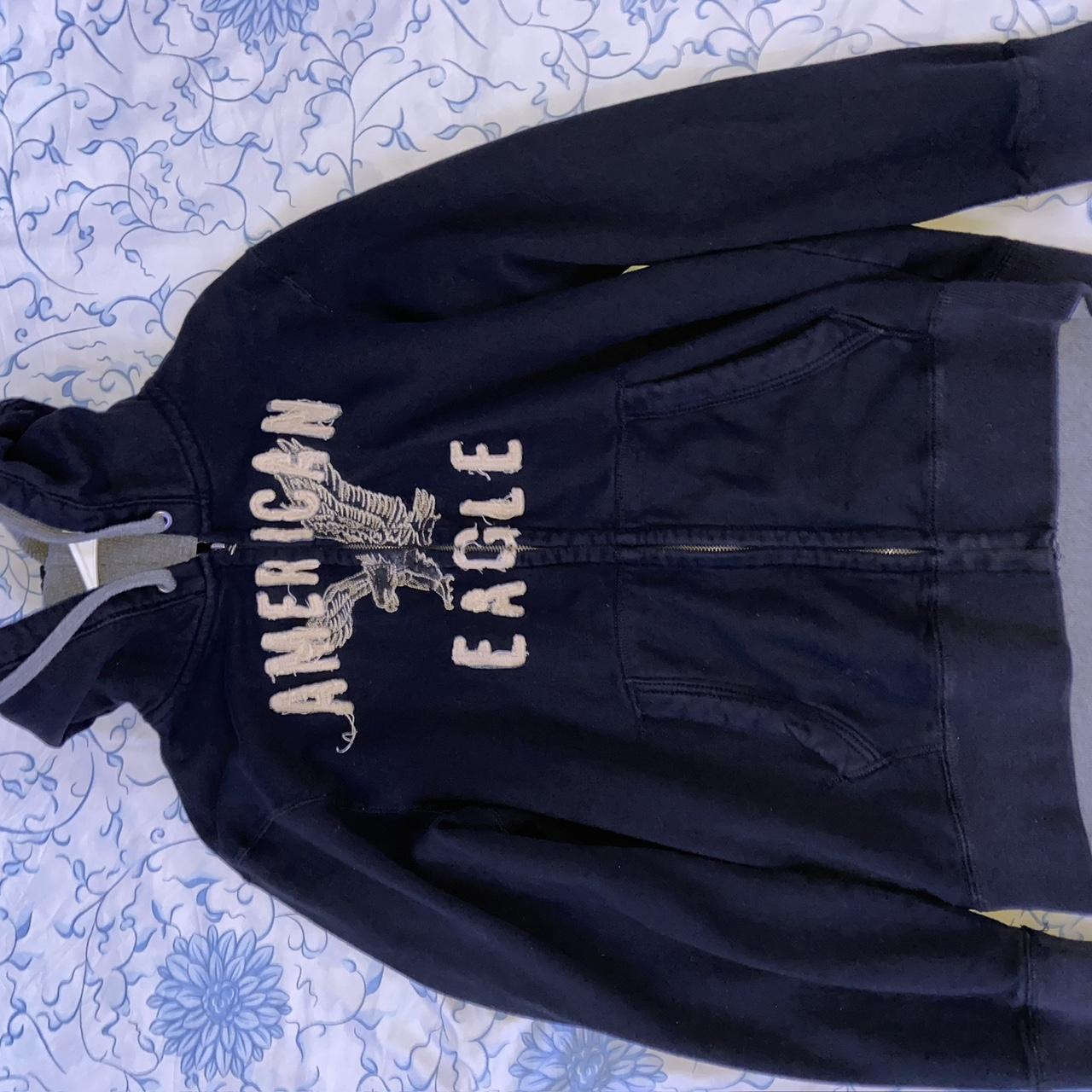 The vintage American Eagle zip-up hoodie is a... - Depop